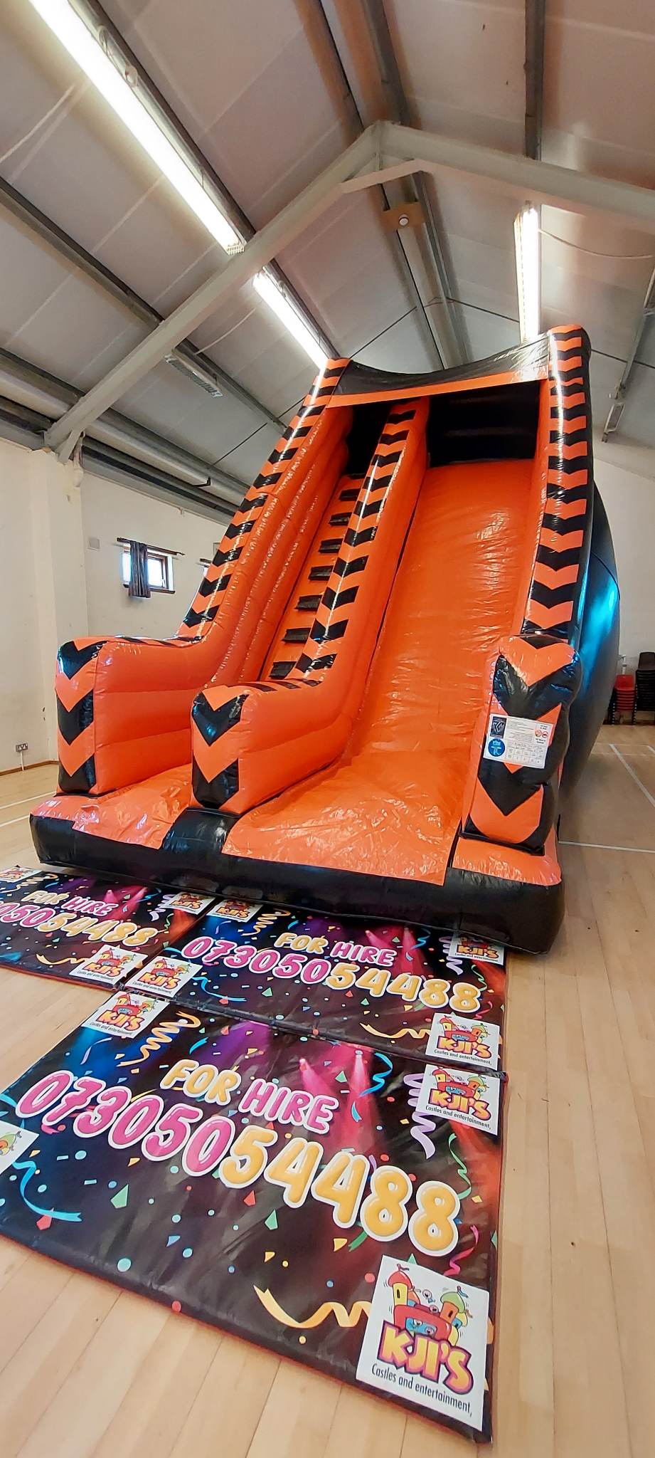 Orange slide 17x14 ft & 15ft high - KJI'S Catles and entertainment